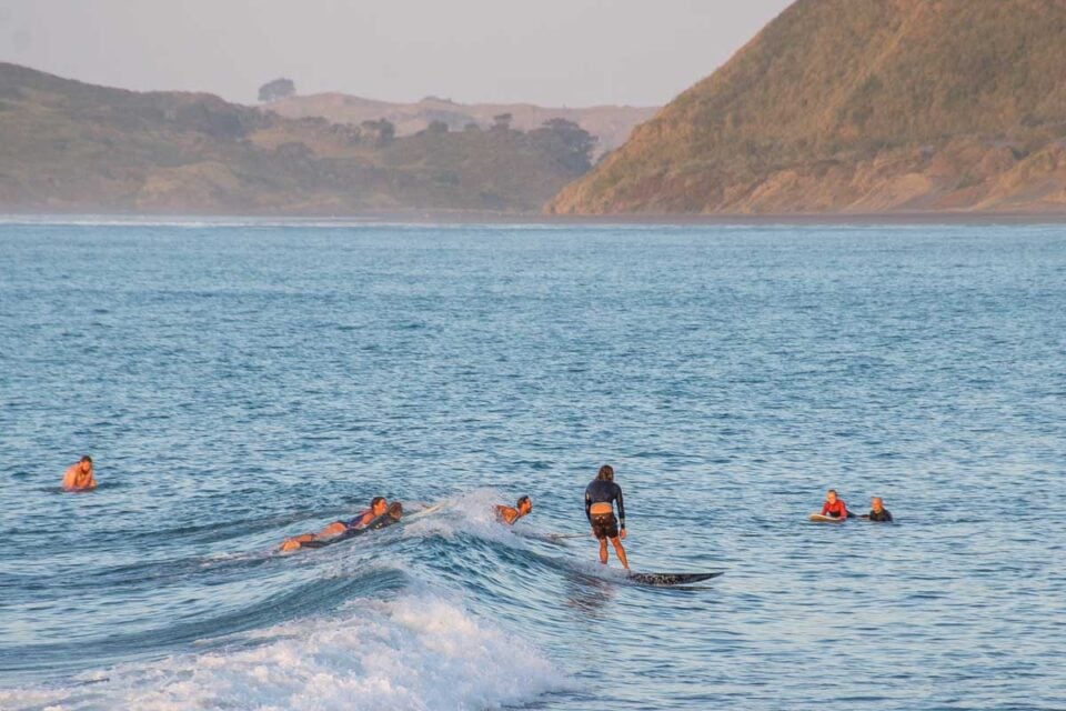 15 BEST Places to Go Surfing in New Zealand + Complete Guide
