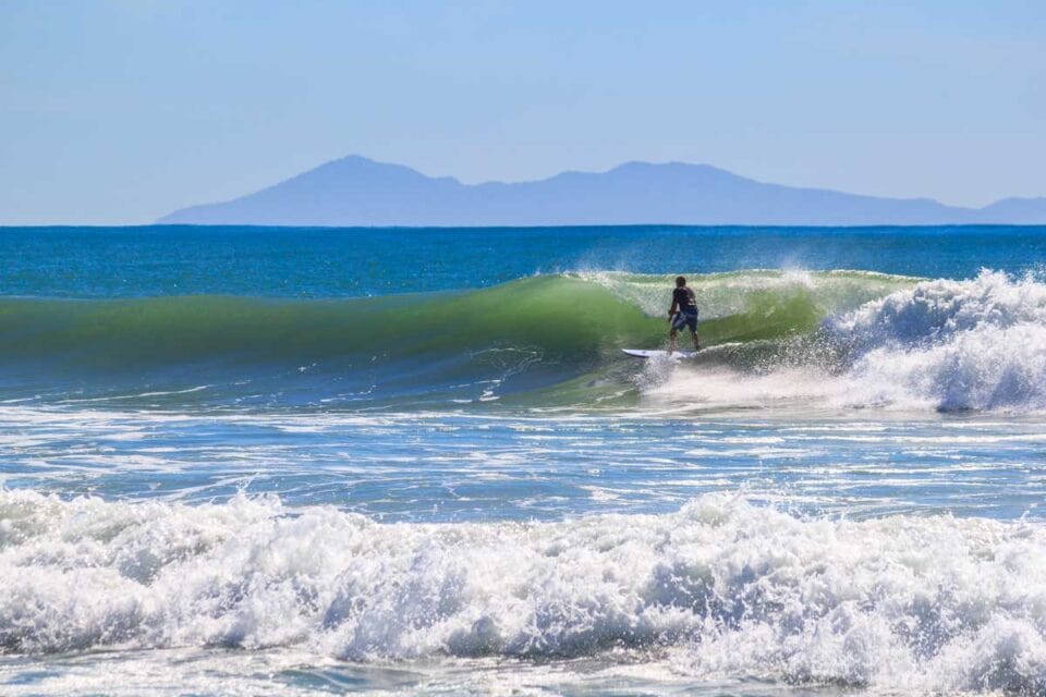 15 BEST Places to Go Surfing in New Zealand + Complete Guide